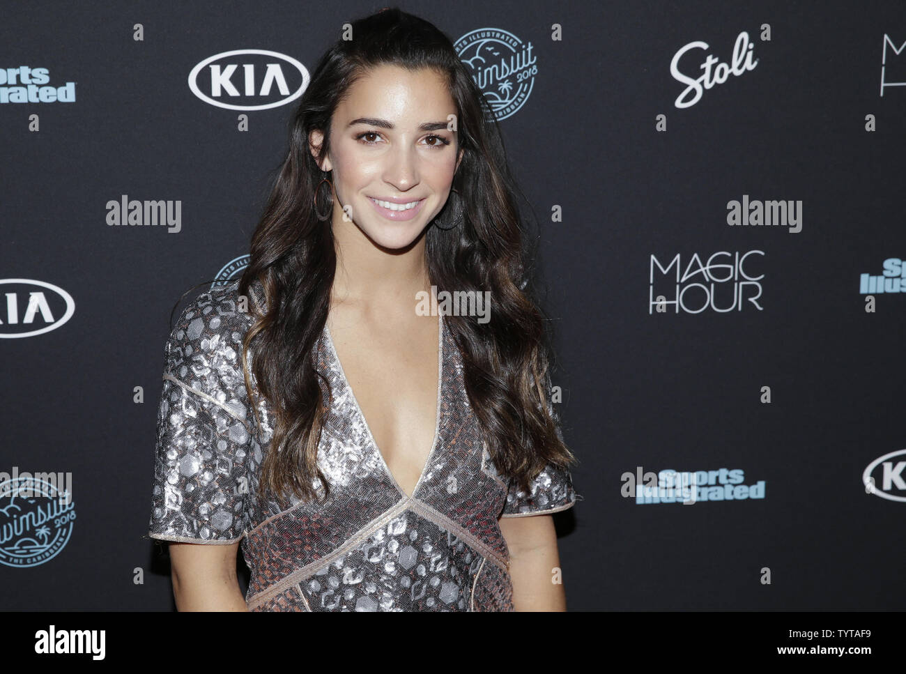 Aly Raisman arrives on the red carpet at the Sports Illustrated ...