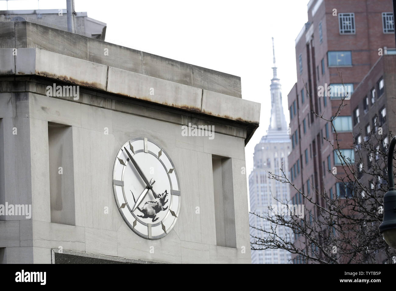 A painting of a rat running in a street clock face like a hamster wheel ...