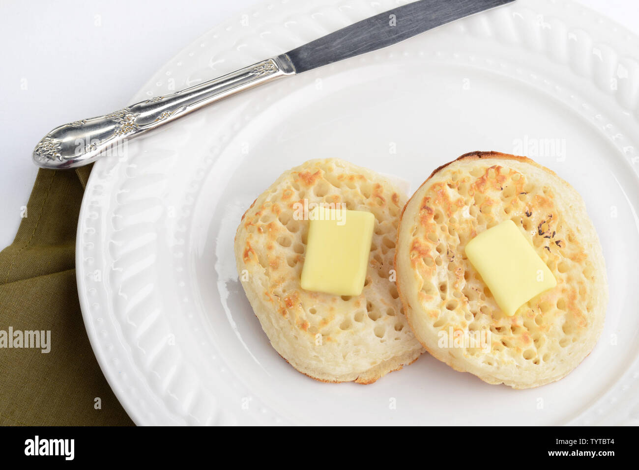 top view english crumpets with butter Stock Photo - Alamy