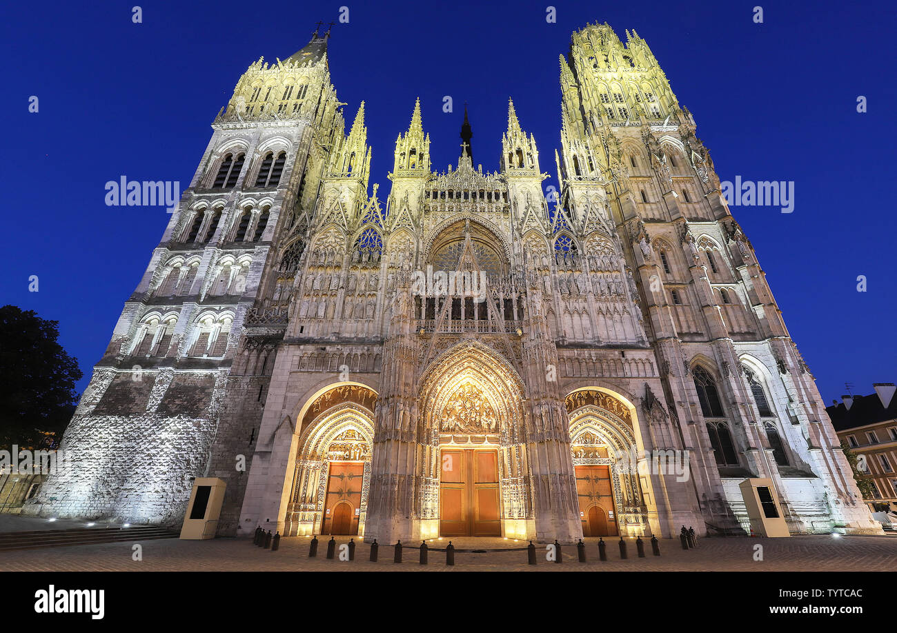 The famous Notre-Dame de Rouen cathedral at twilight, Rouen, France. It ...