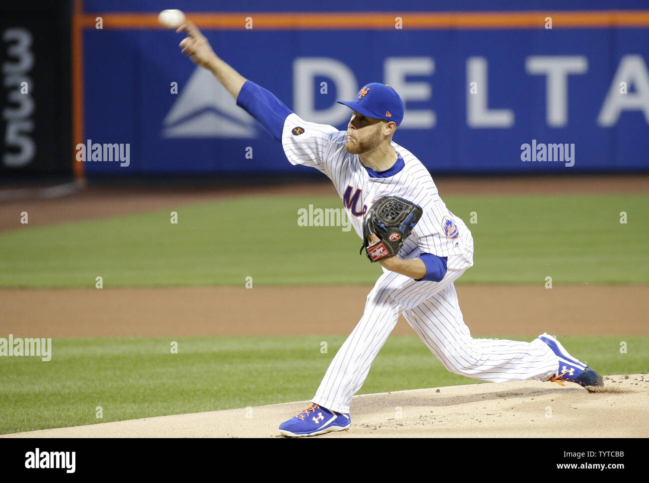 New York Mets starting pitcher Zach Wheeler throws a pitch in the first ...