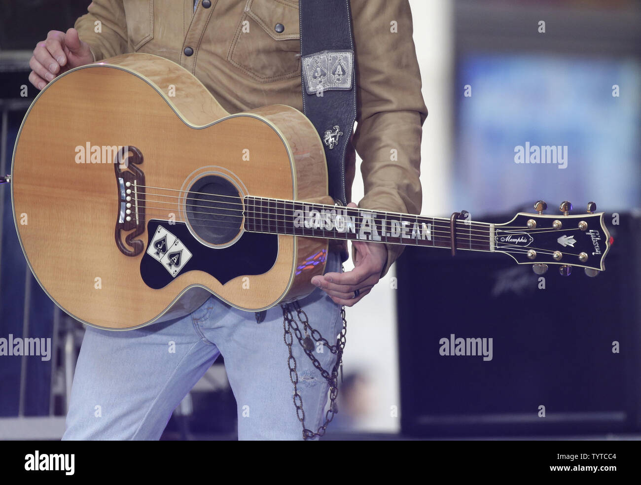 Jason Aldean holds his guitar when he performs on the NBC Today Show at ...