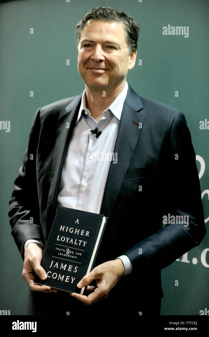 Former FBI Director James Comey arrives to speak about and sign copies ...