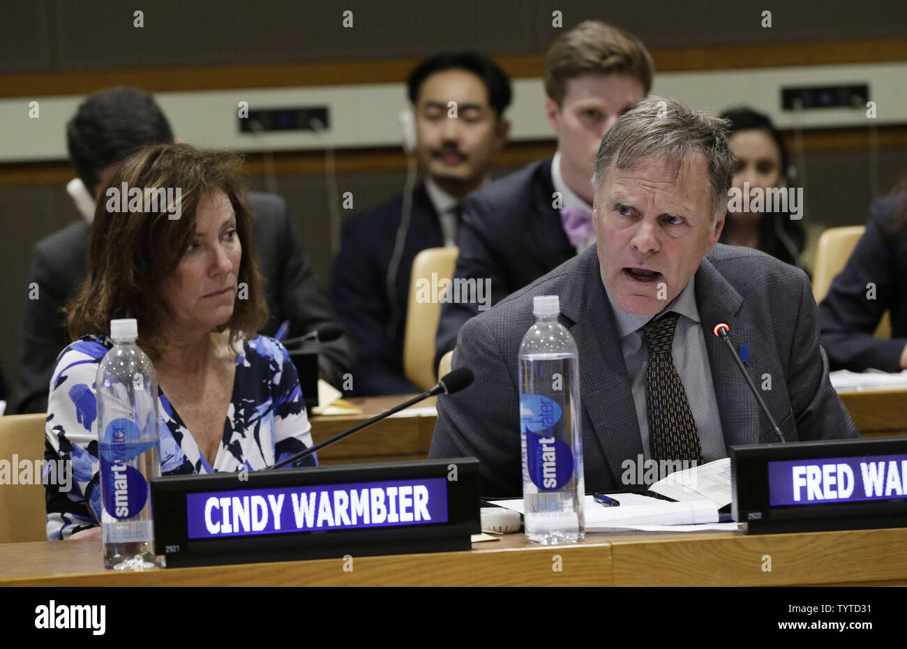 Cindy Warmbier sits next to Fred Warmbier as he speaks at a meeting on ...