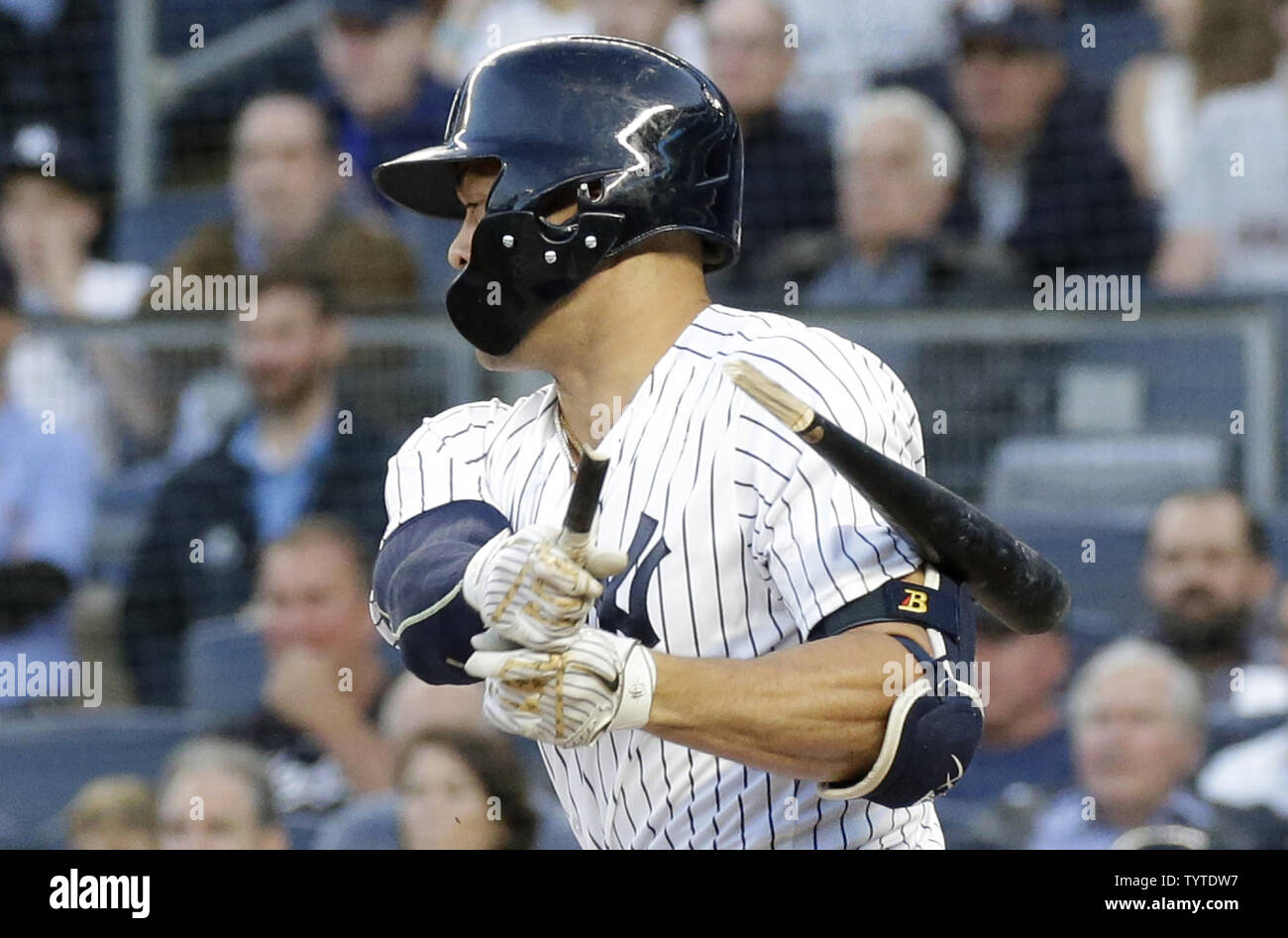 New York Yankees Giancarlo Stanton breaks his bat when he swings at a ...