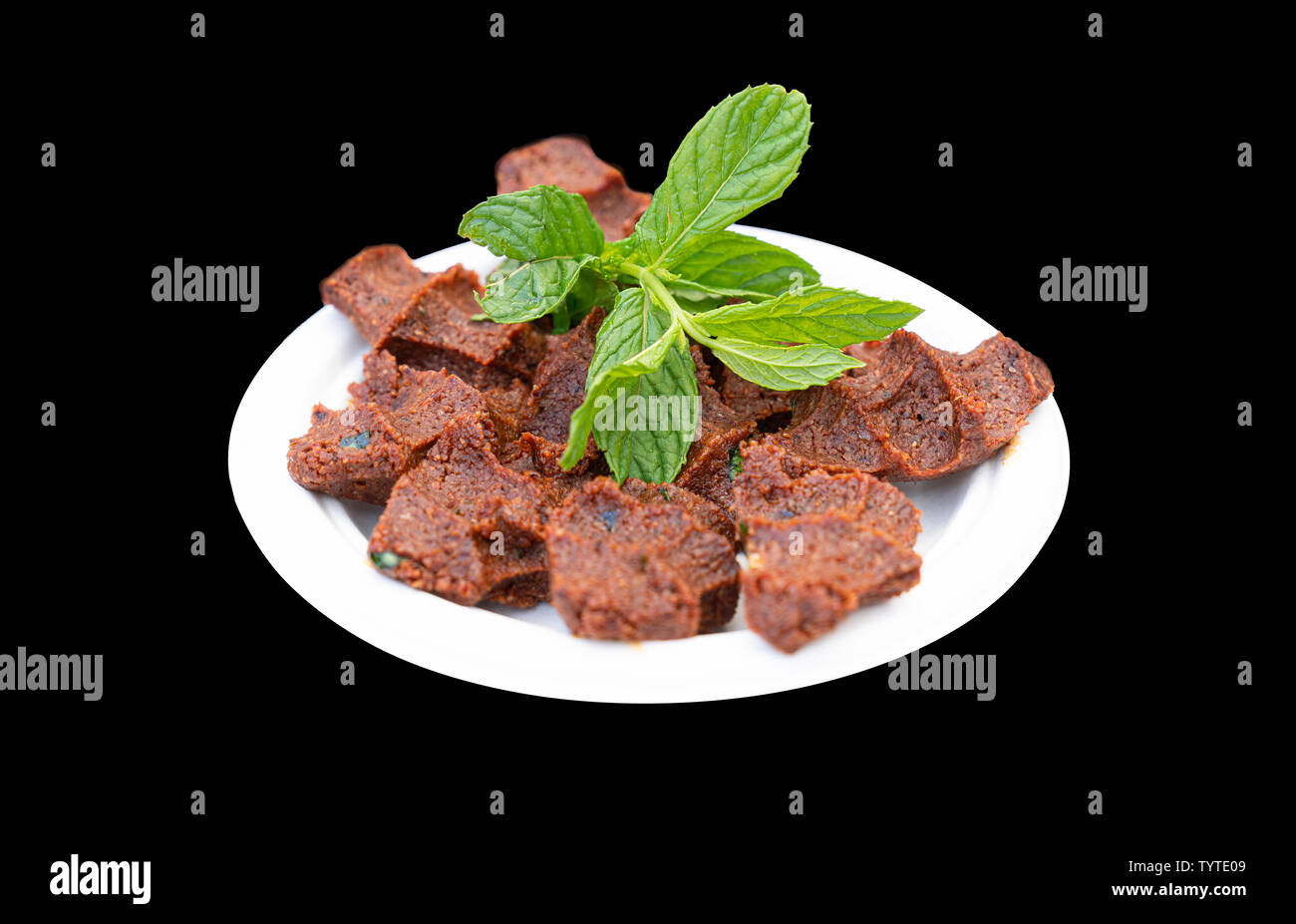 Close up of traditional Turkish appetizer raw meatballs - cig kofte ...