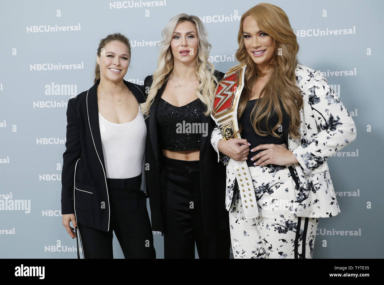 Ronda Rousey, Niz Jax and Charlotte Flair of ''WWE' arrive on the red ...