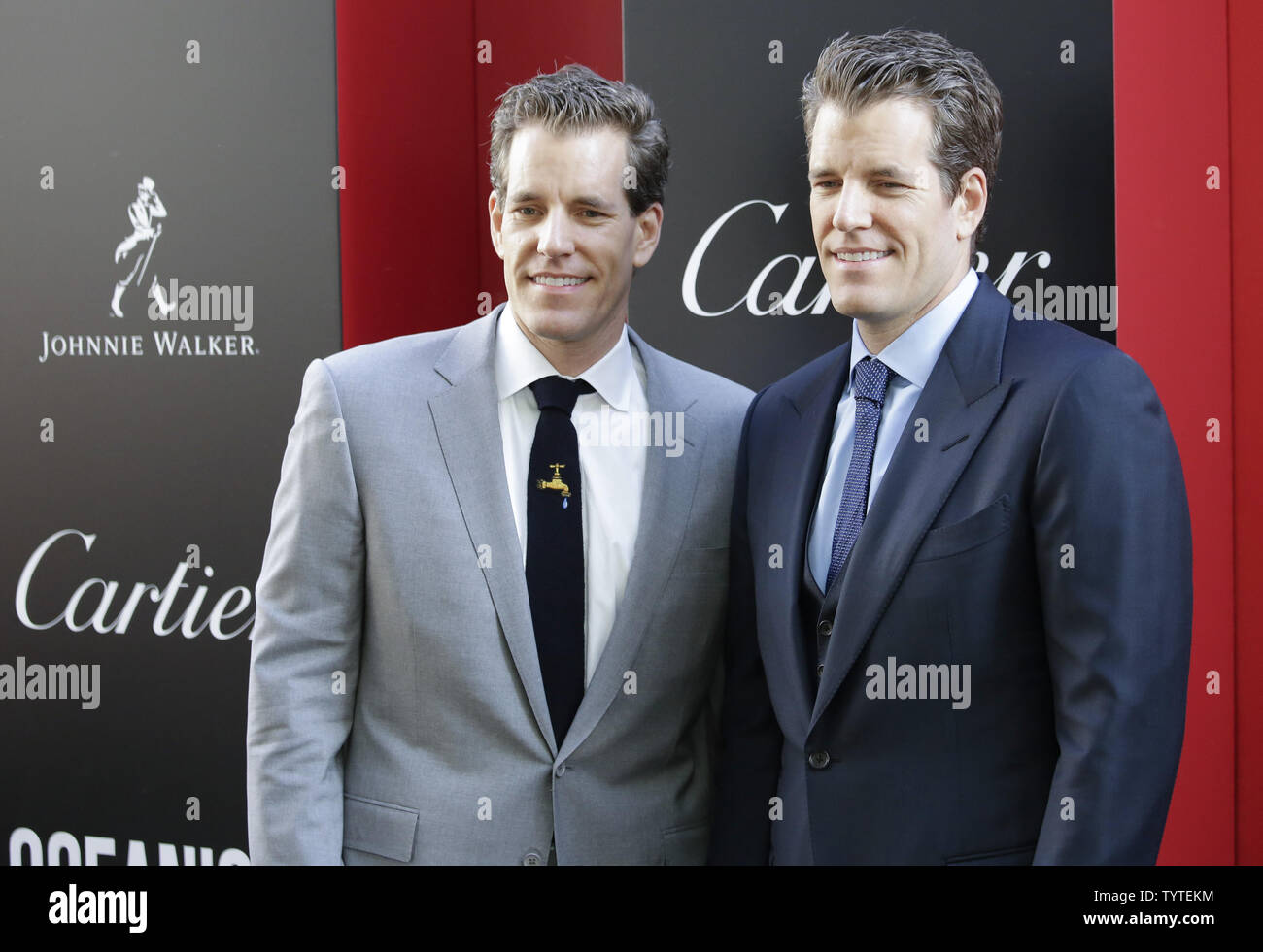 Cameron Winklevoss and Tyler Winklevoss arrive on the red carpet at the ...