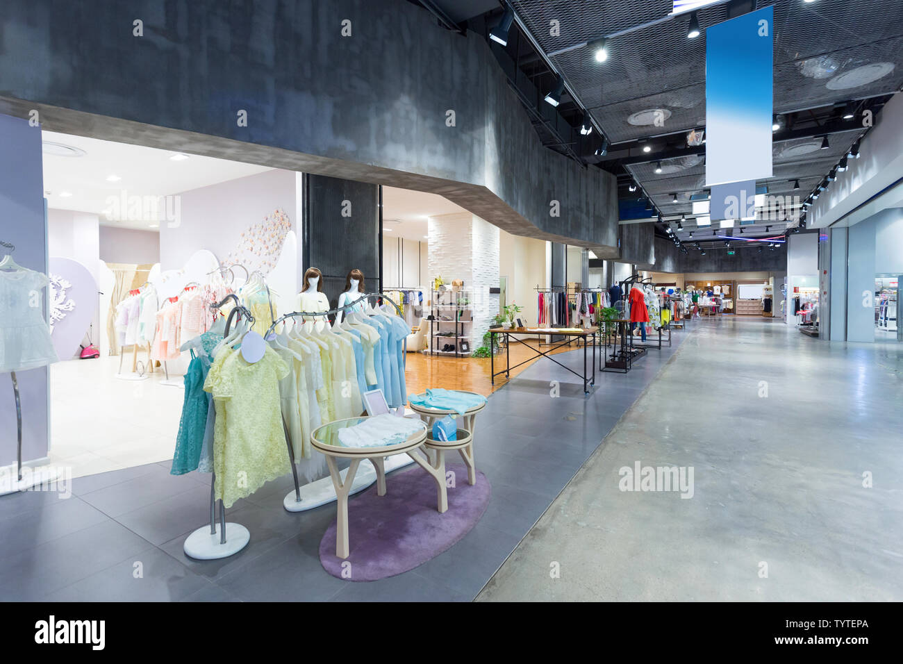 mannequins in fashion shop display window Stock Photo - Alamy