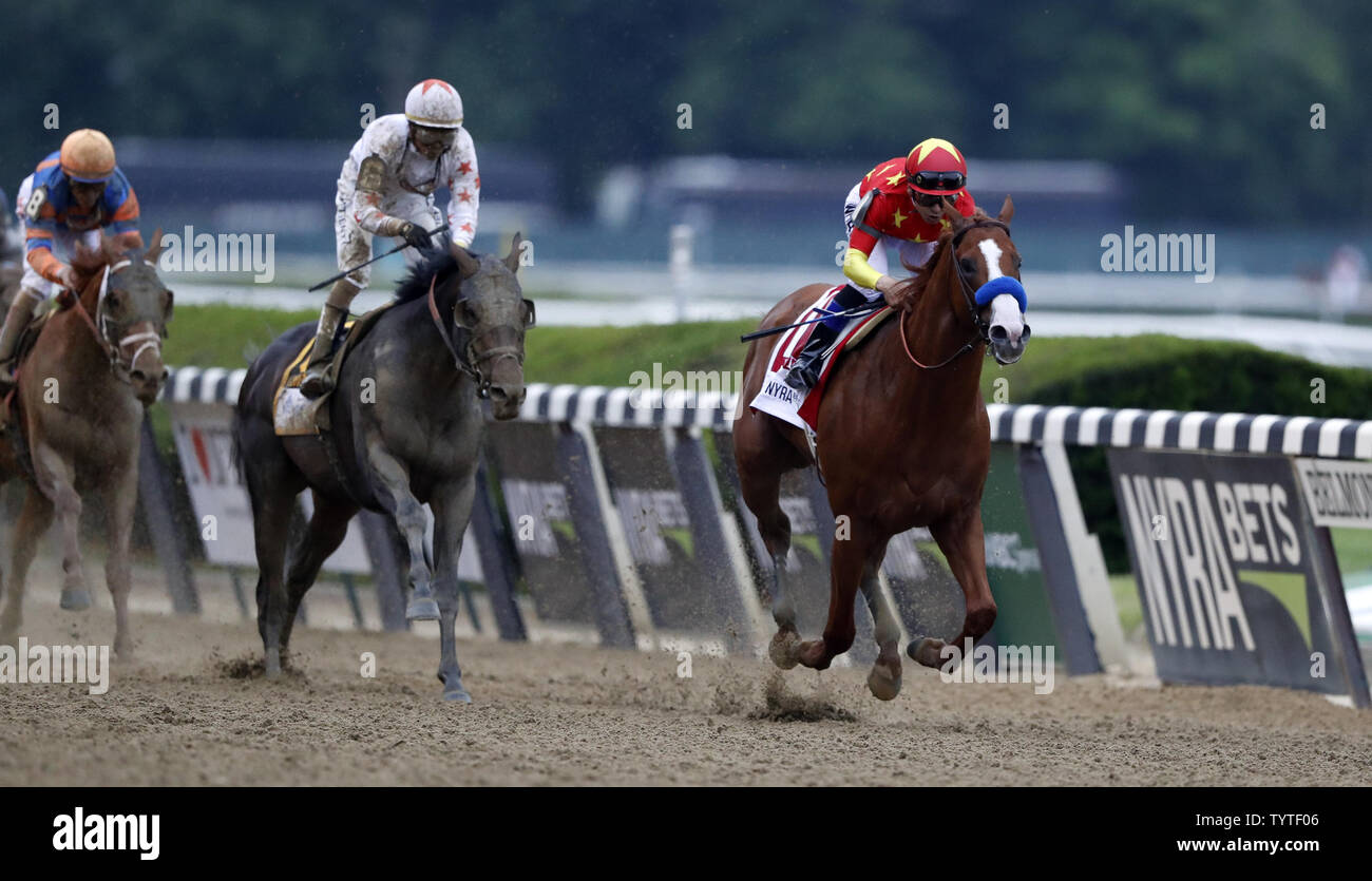 Jockey Mike Smith aboard Justify races towards the finish line to win ...