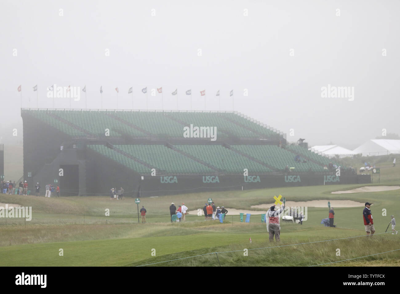 A mostly empty grandstand is situated on the course on the Wednesday ...