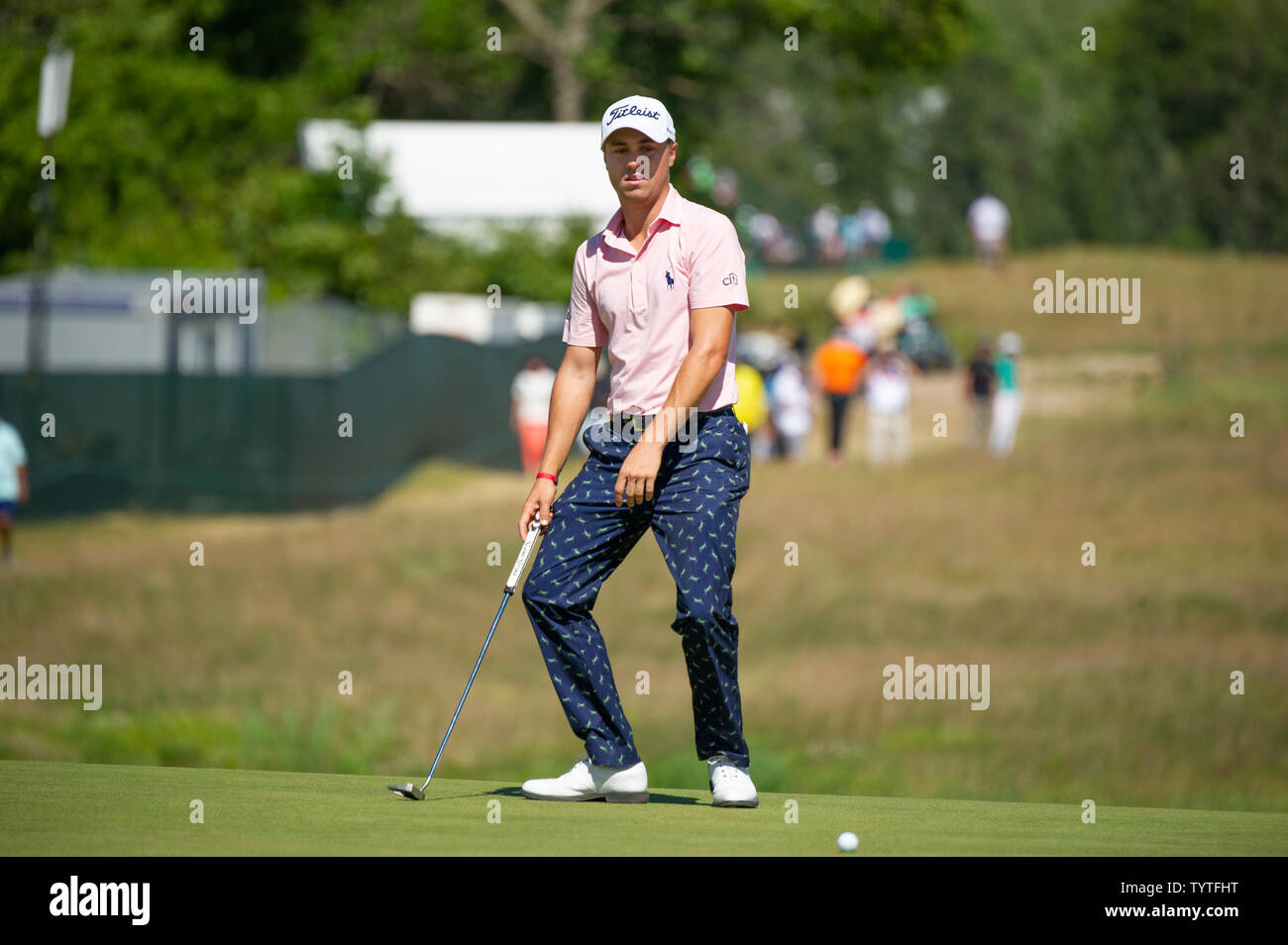 Justin Thomas reacts to a missed putt on the sixth green in the first ...