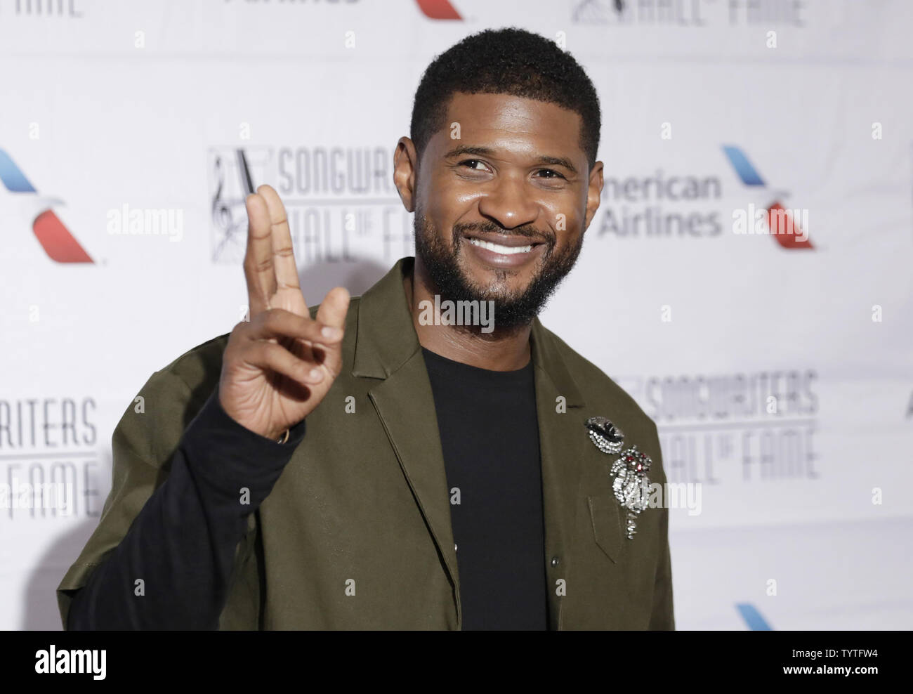 Usher arrives on the red carpet at the Songwriters Hall of Fame 49th ...