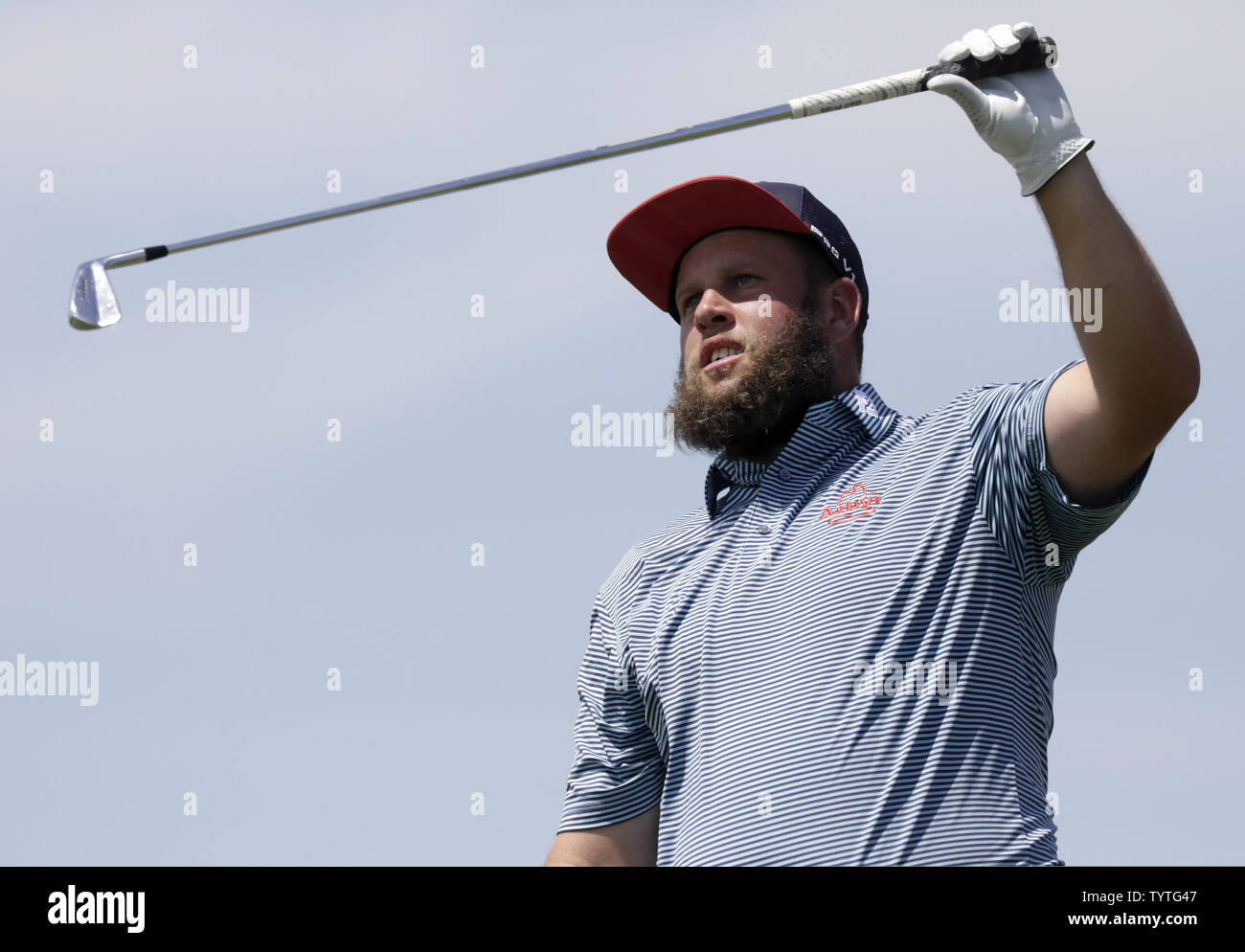 Andrew 'Beef' Johnson reacts after a tee shot on the first hole in the ...