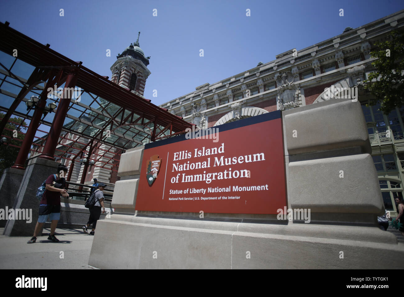Tourists visit the Ellis Island National Museum of Immigration 2 days ...