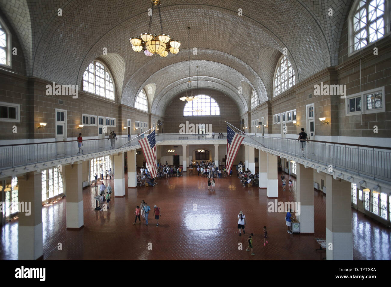Tourists visit the Ellis Island National Museum of Immigration 2 days ...