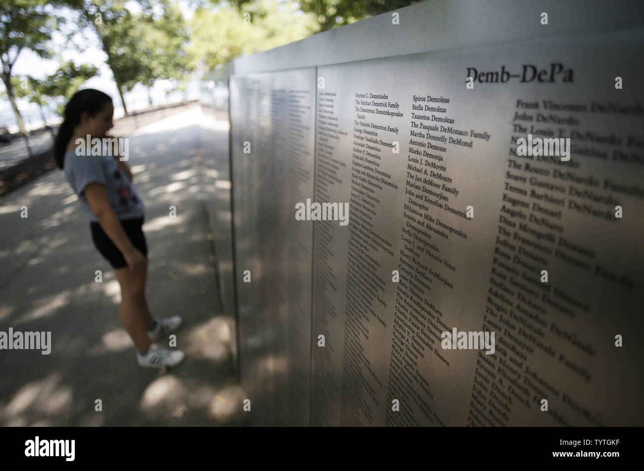 The names of Immigrants who passed through Ellis Island are engraved on ...
