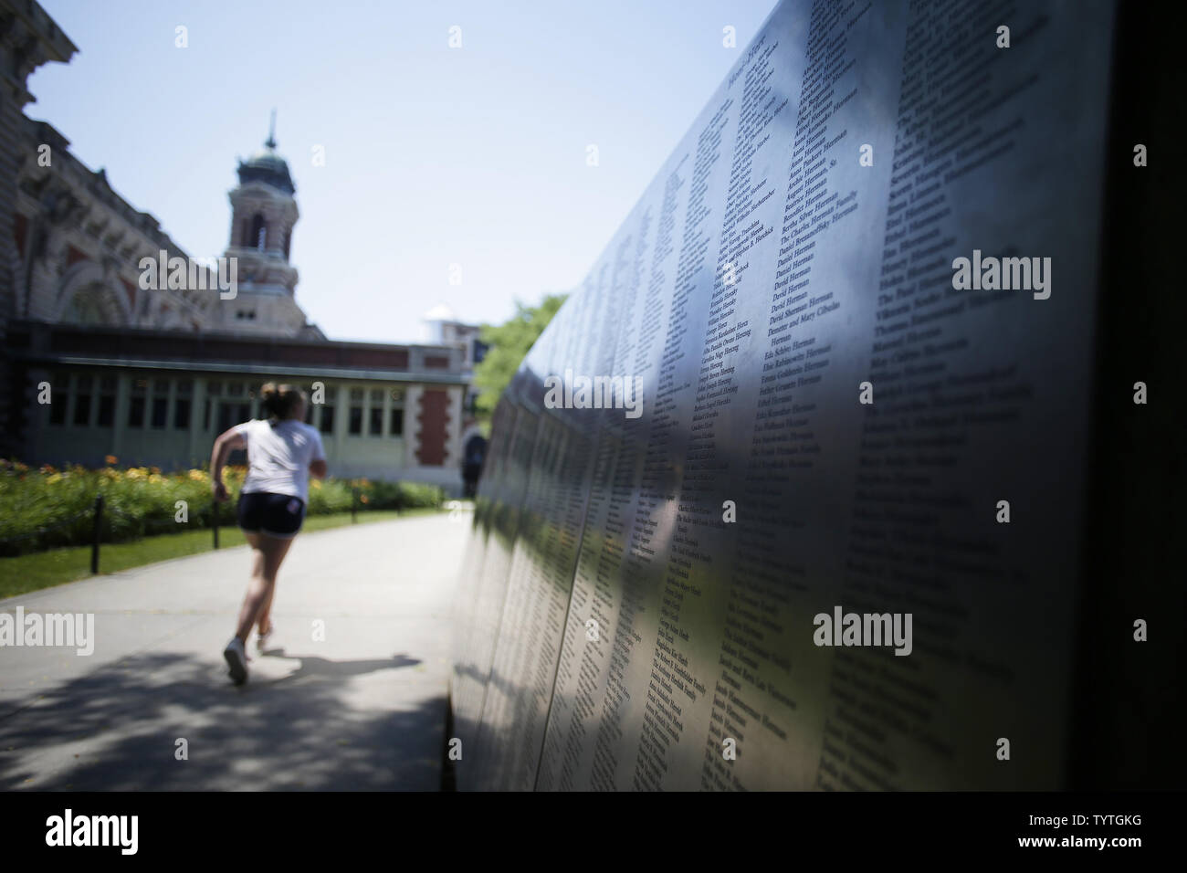The names of Immigrants who passed through Ellis Island are engraved on ...