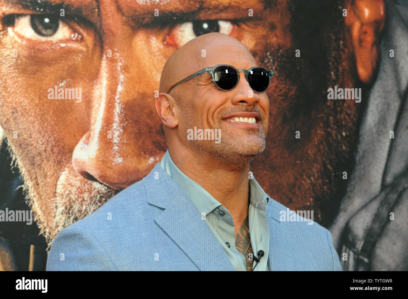 Dwayne Johnson arrives on the red carpet at the 'Skyscraper' New York ...