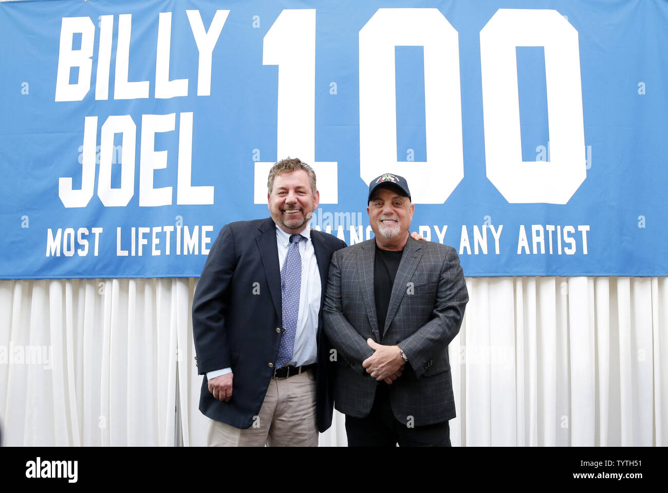 Billy Joel stands with The Madison Square Company executive chairman ...