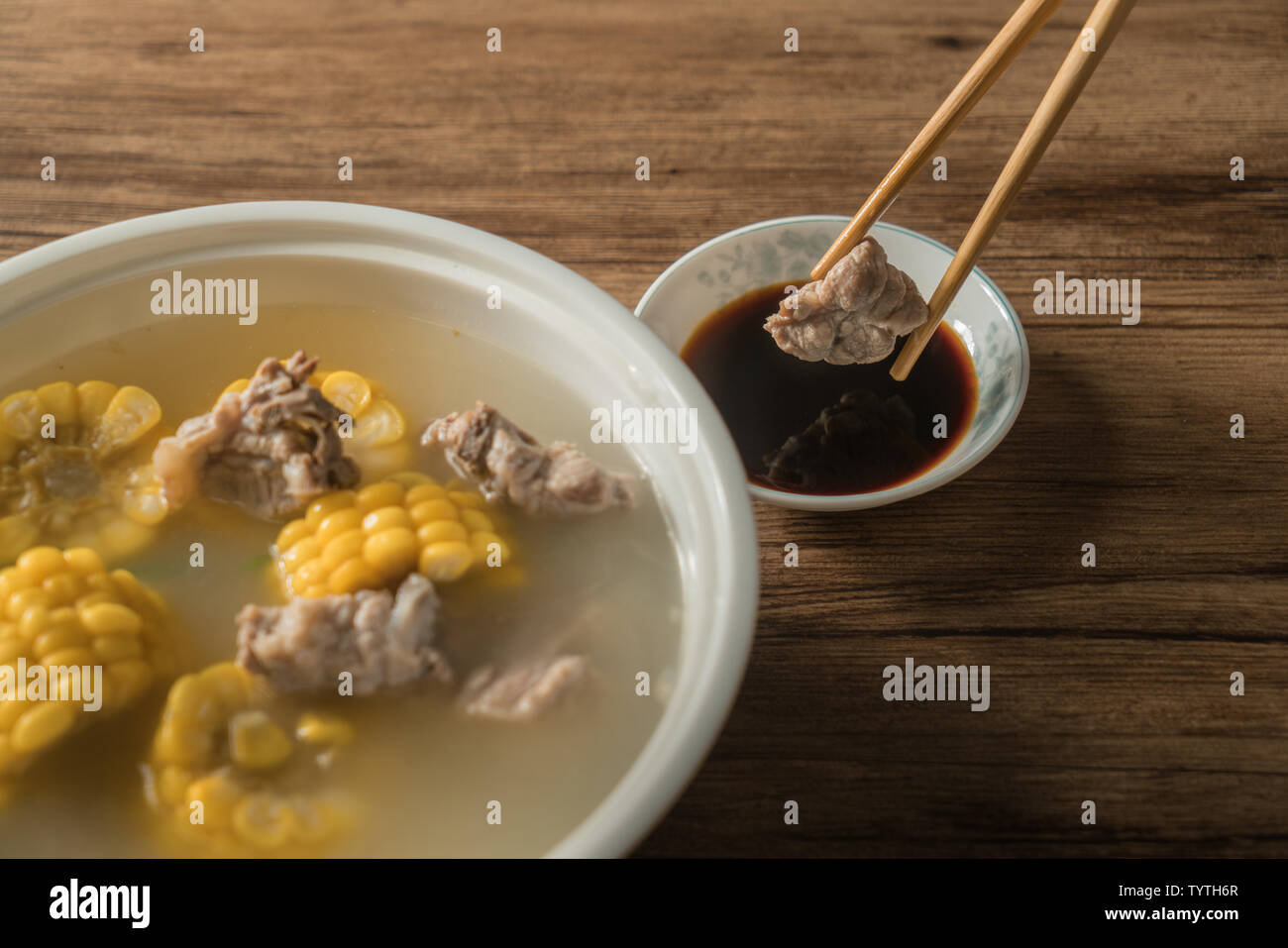 Corn bone broth with wood pattern background Stock Photo - Alamy