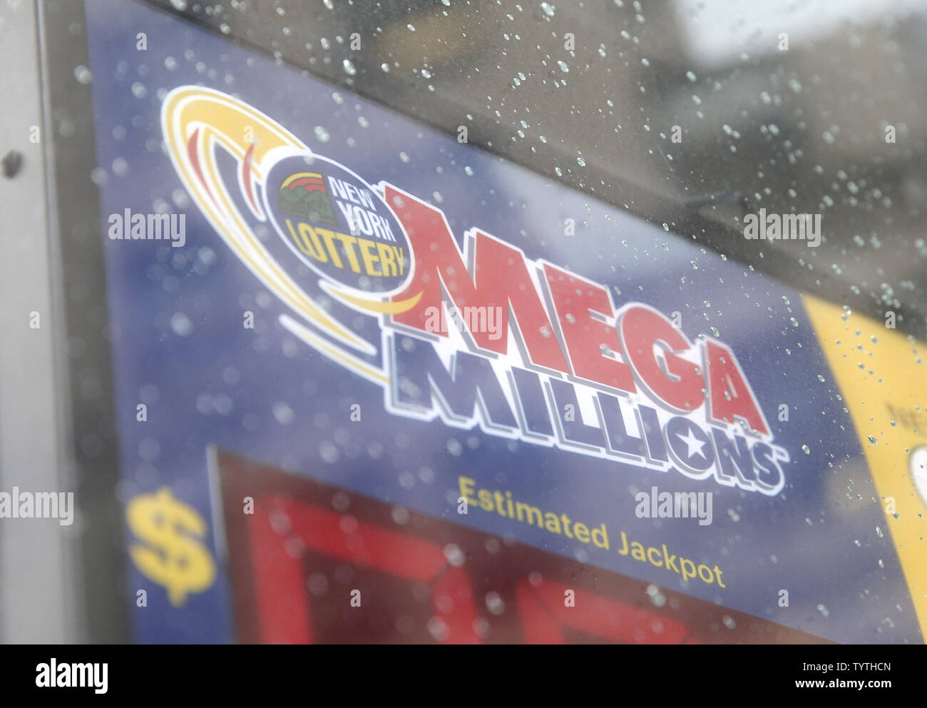 A Mega Millions sign is on display at a newspaper stand on July 23 ...
