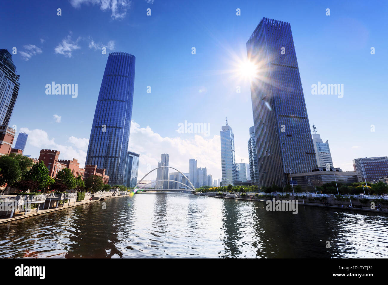 modern buildings in urban city at riverbank Stock Photo - Alamy