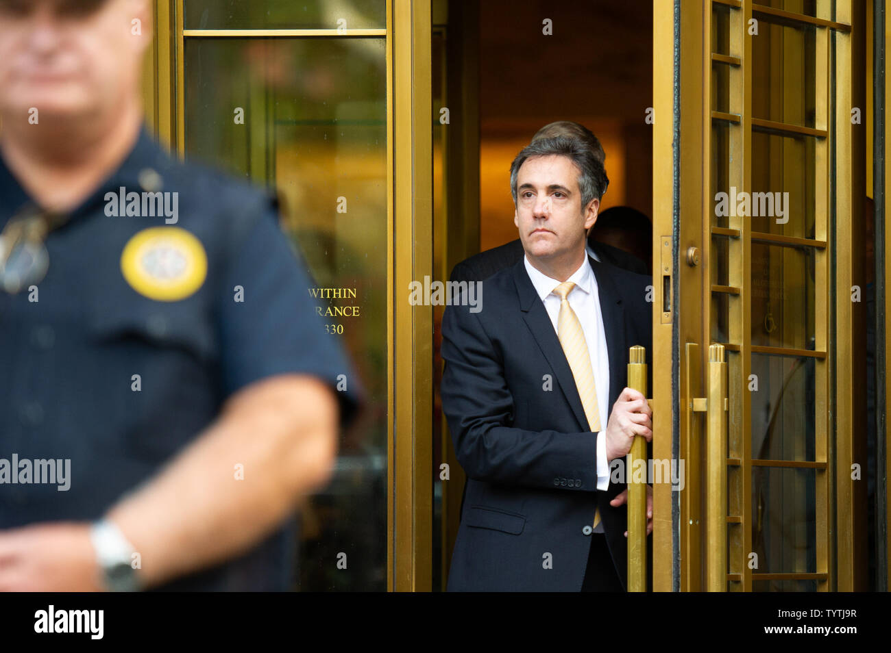 Attorney Michael Cohen walks out of Federal Courthouse after pleading ...