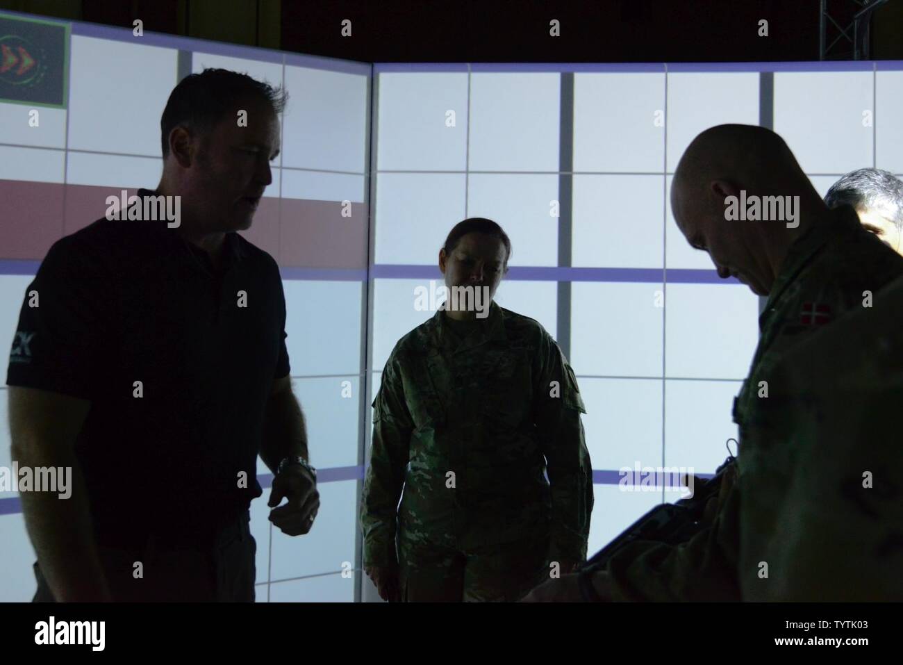 U.S. Army Command Sgt. Maj. Sheryl Lyon (middle), the U.S. Army Europe ...