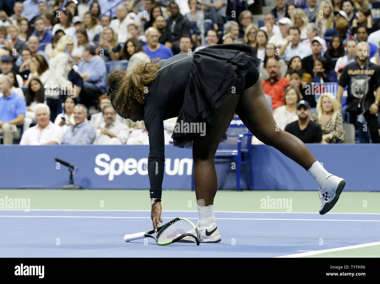 Serena Williams breaks her racket in the 2nd set of her match against ...