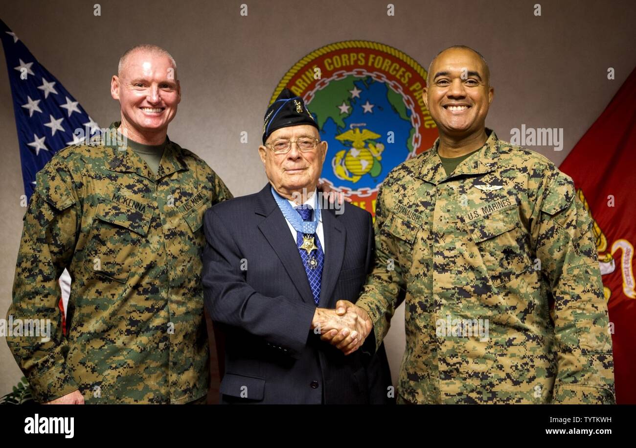 U.S. Marine Brig. Gen. Brian Cavanaugh, right, greets former Marine ...