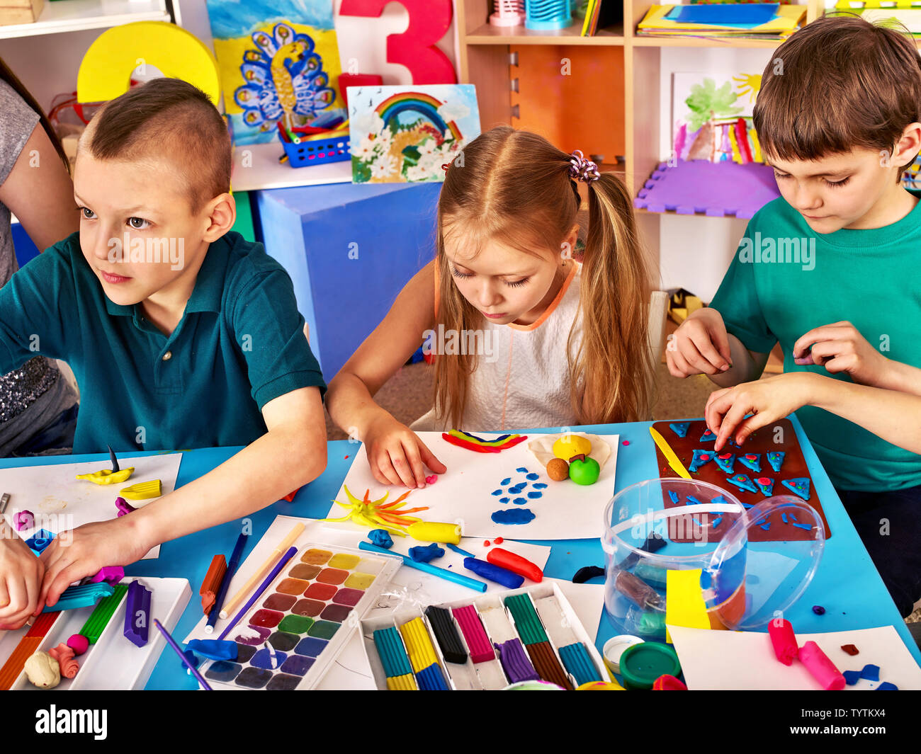 Children sculpt from clay and draw Stock Photo - Alamy