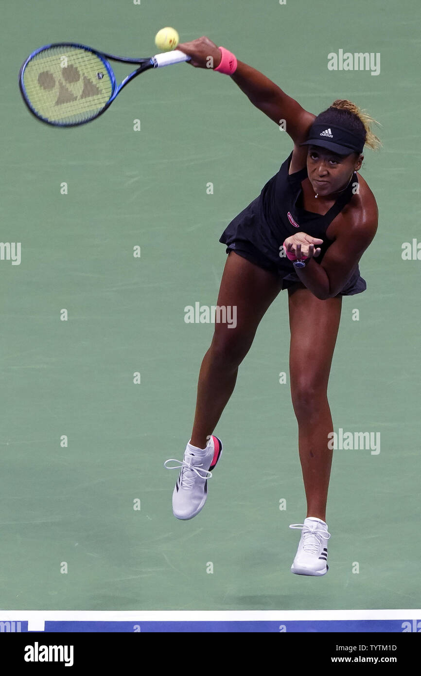 Naomi Osaka of Japan serves to Serena Williams of the United States in ...