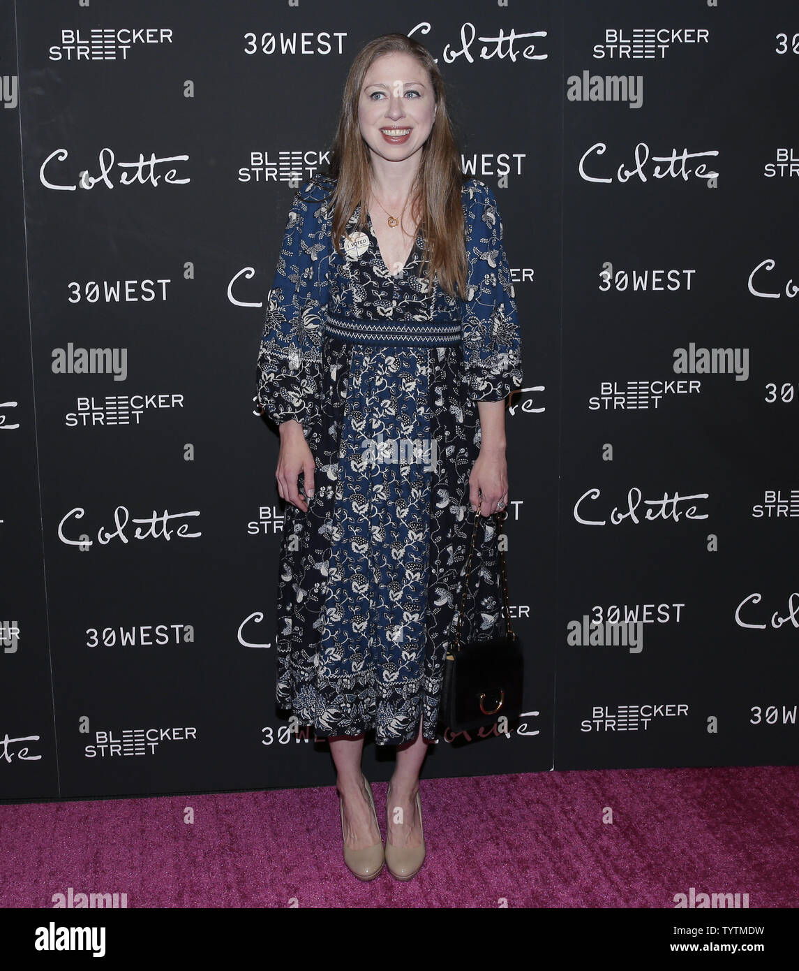 Chelsea Clinton arrives on the red carpet at the New York screening of ...