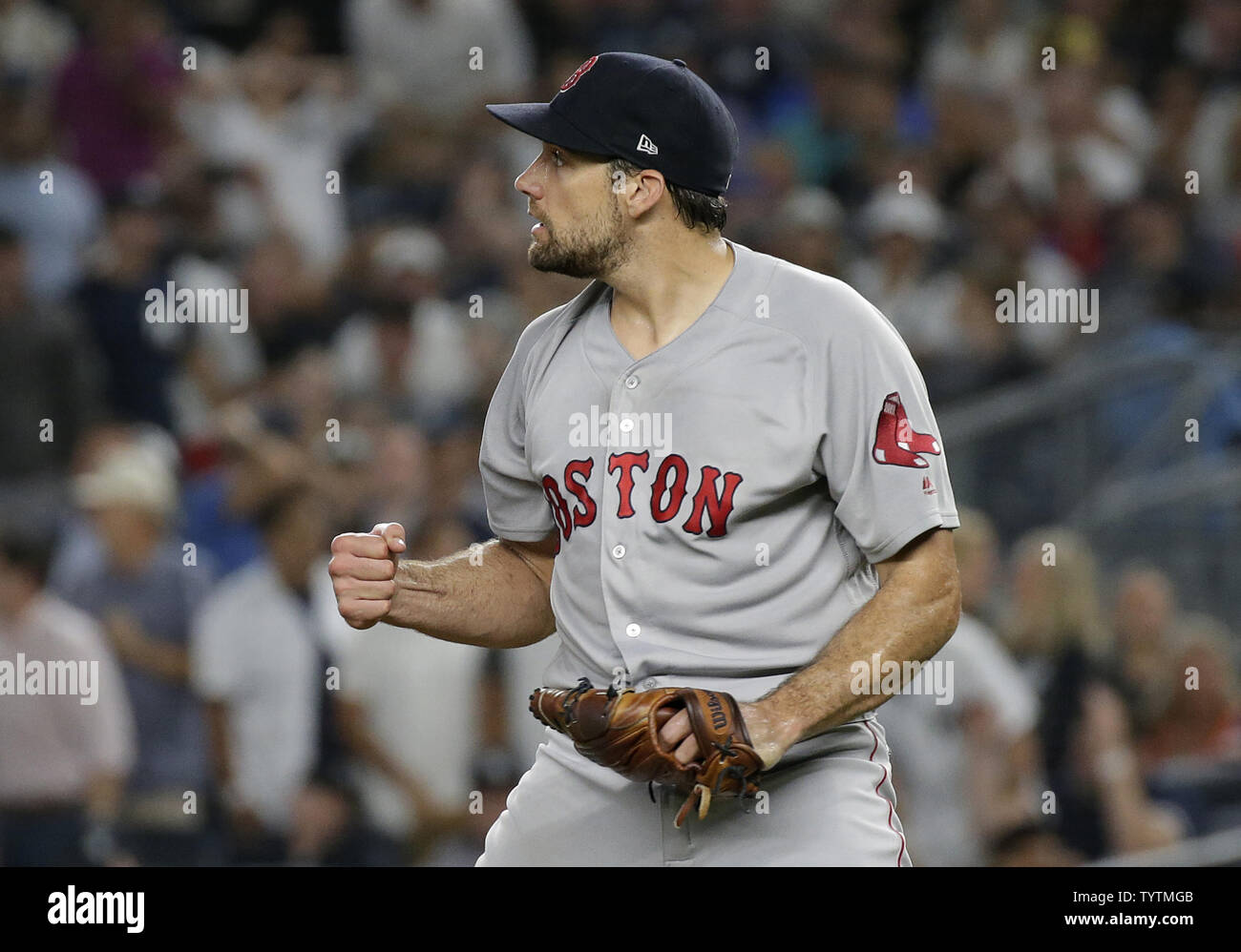 Boston Red Sox starting pitcher Nathan Eovaldi pumps his fist after ...
