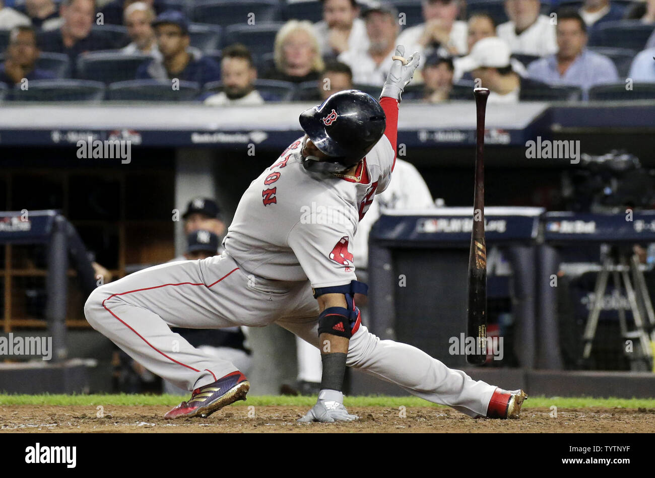 Boston Red Sox Eduardo Nunez falls backwards to avoid being hit by a ...