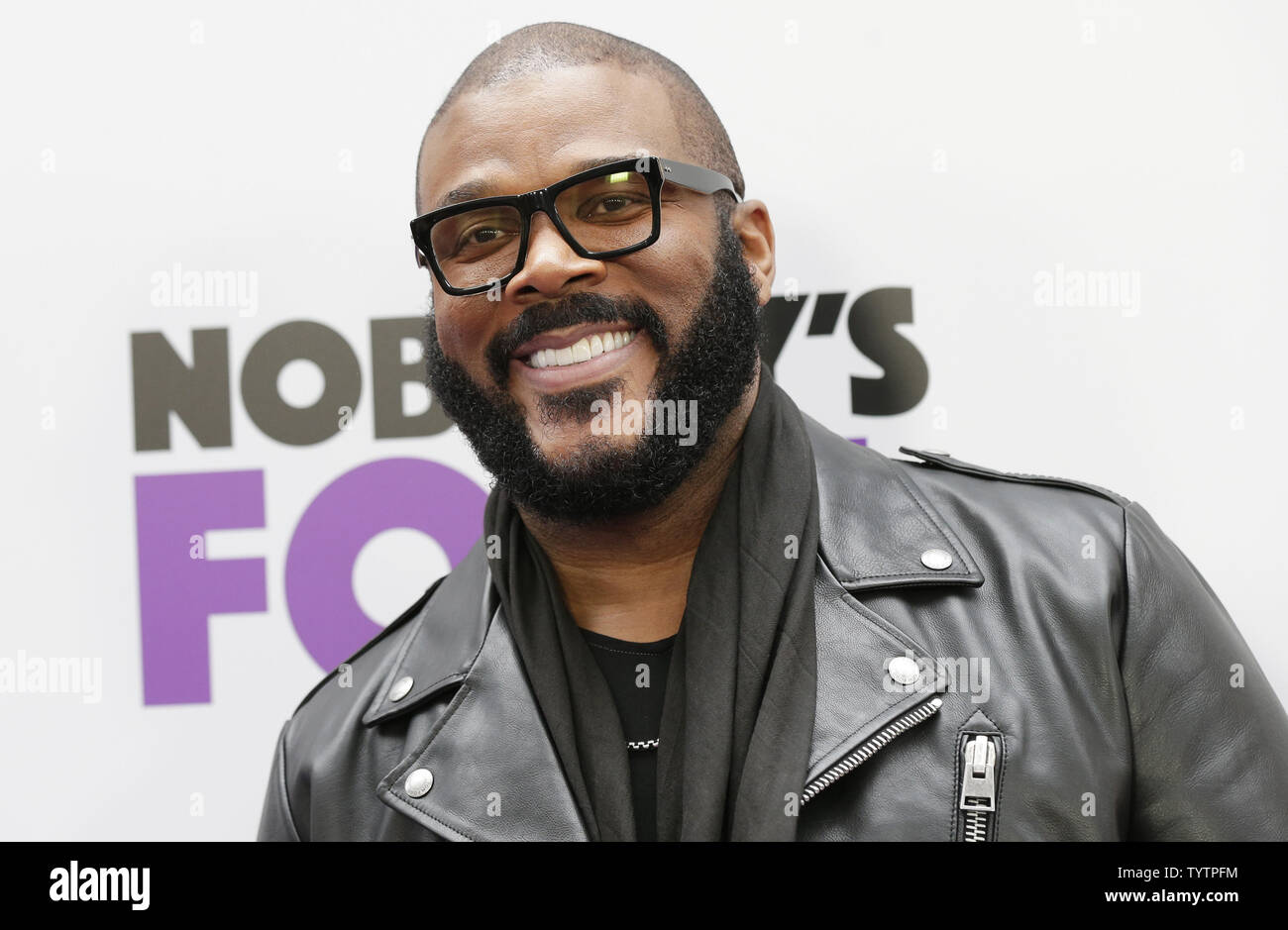 Tyler Perry arrives on the red carpet at the world premiere of 'Nobody ...