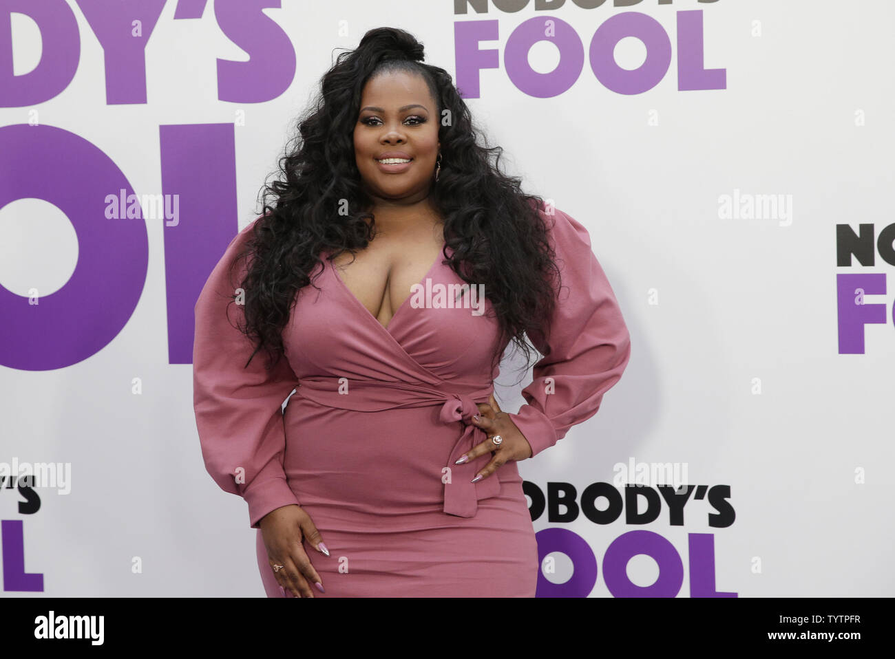 Amber Riley arrives on the red carpet at the world premiere of 'Nobody ...