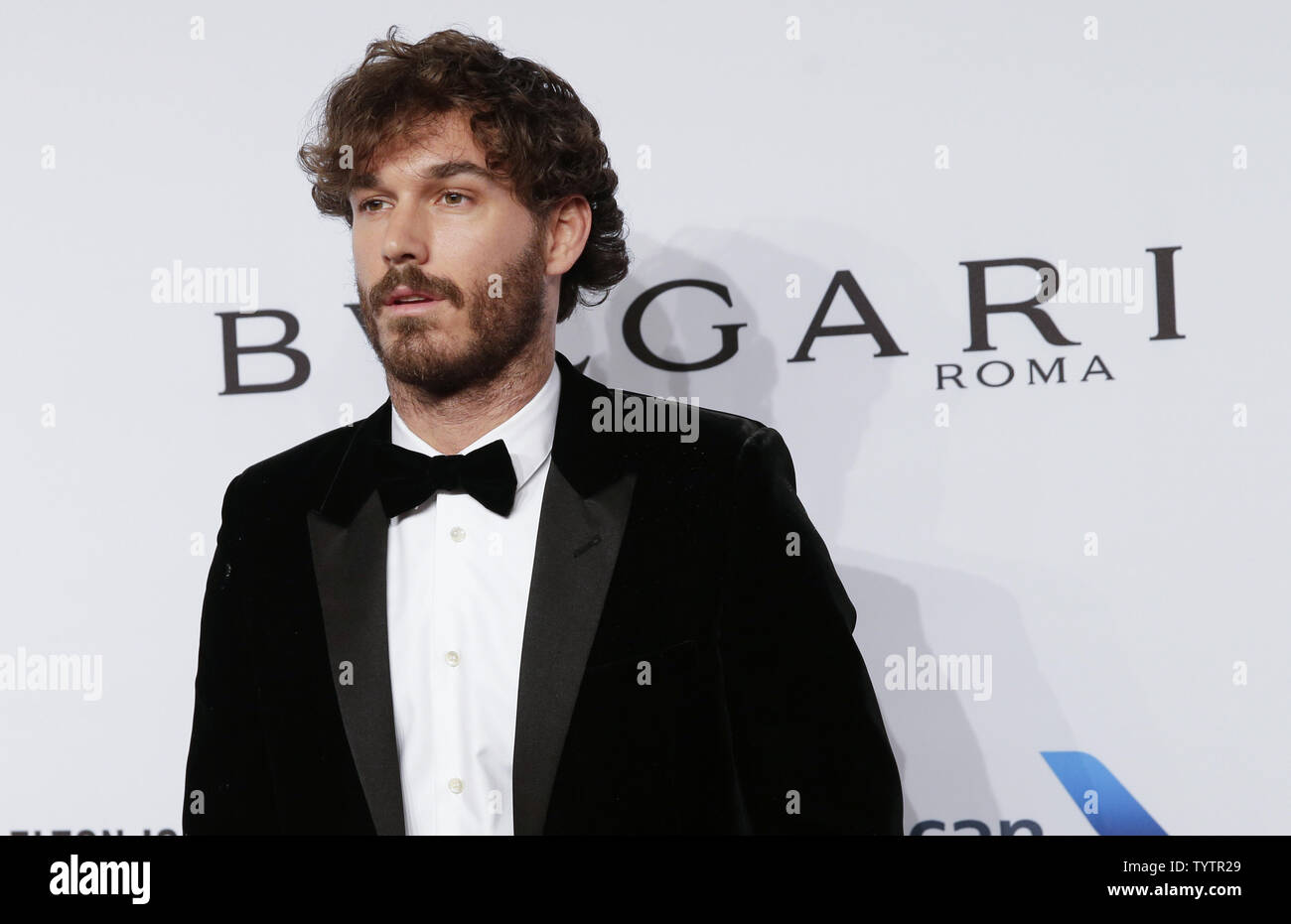 David Alexander Flinn arrives on the red carpet at the Elton John AIDS ...