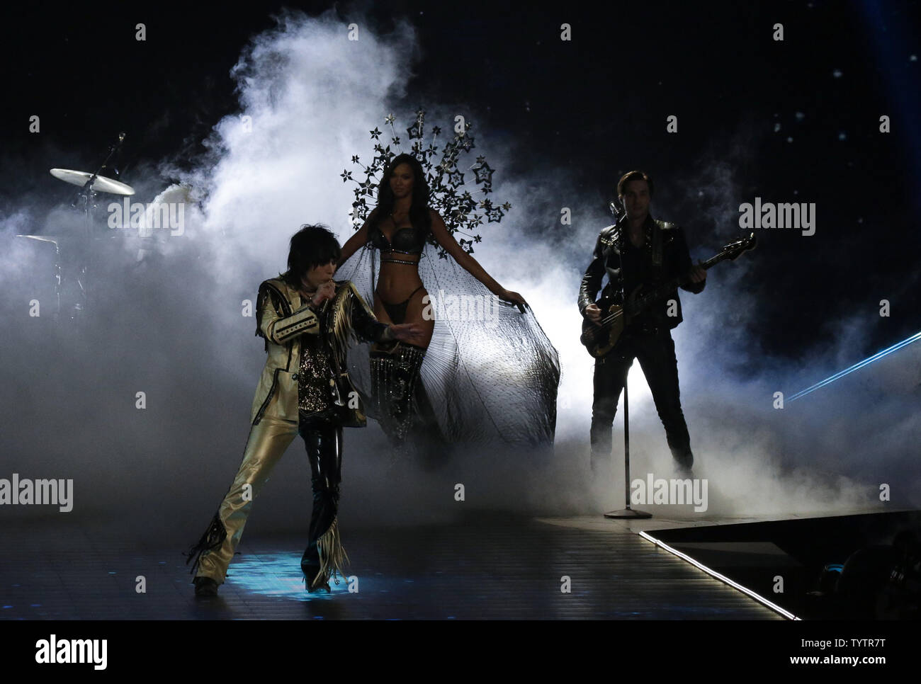 Luke Spiller performs with The Struts on the runway at the 2018 ...