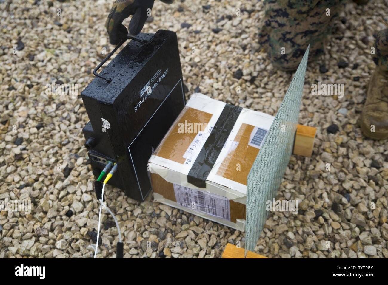 A U.S. Marine Corps Explosive Ordnance Disposal technician assigned to ...