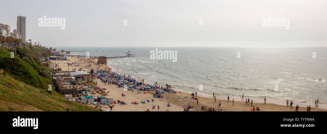 Tel Aviv, Israel - April 13, 2019: Beautiful view of a crowded beach in ...
