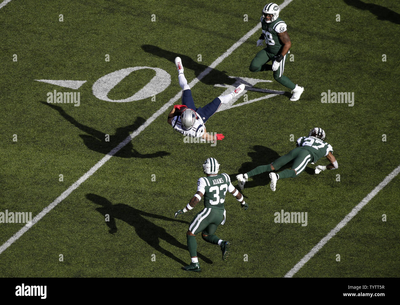 New England Patriots Julian Edelman gets up ended after making a catch ... New England Patriots Julian Edelman gets up ended after making a catch ...