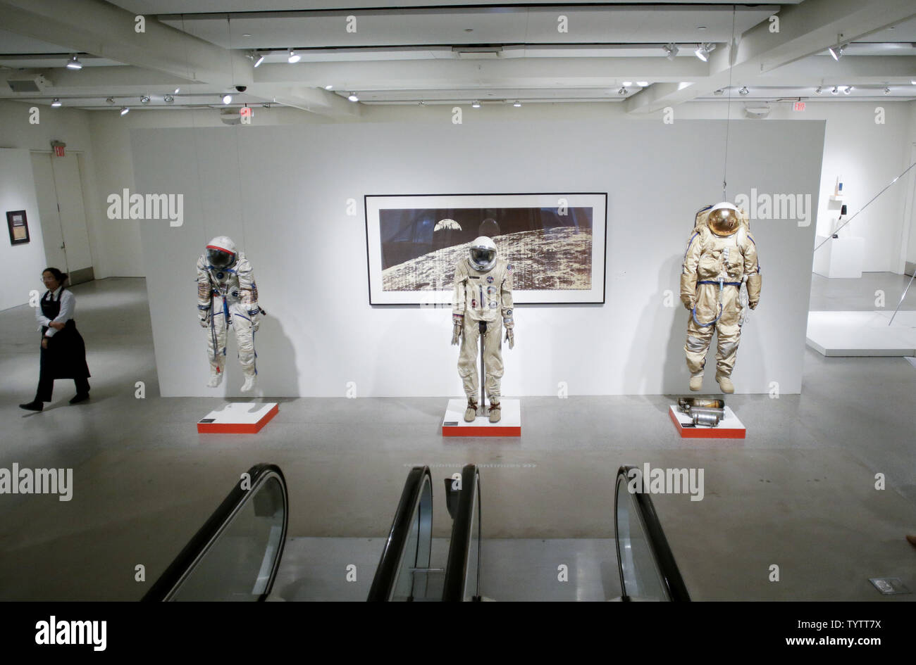A Complete Gemini Spacesuit along with other space suits are on display ...