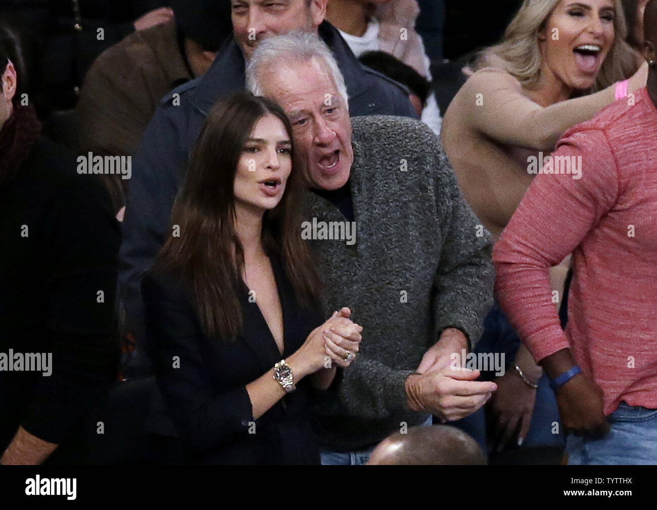 Emily Ratajkowski watches the Milwaukee Bucks play the New York Knicks ...