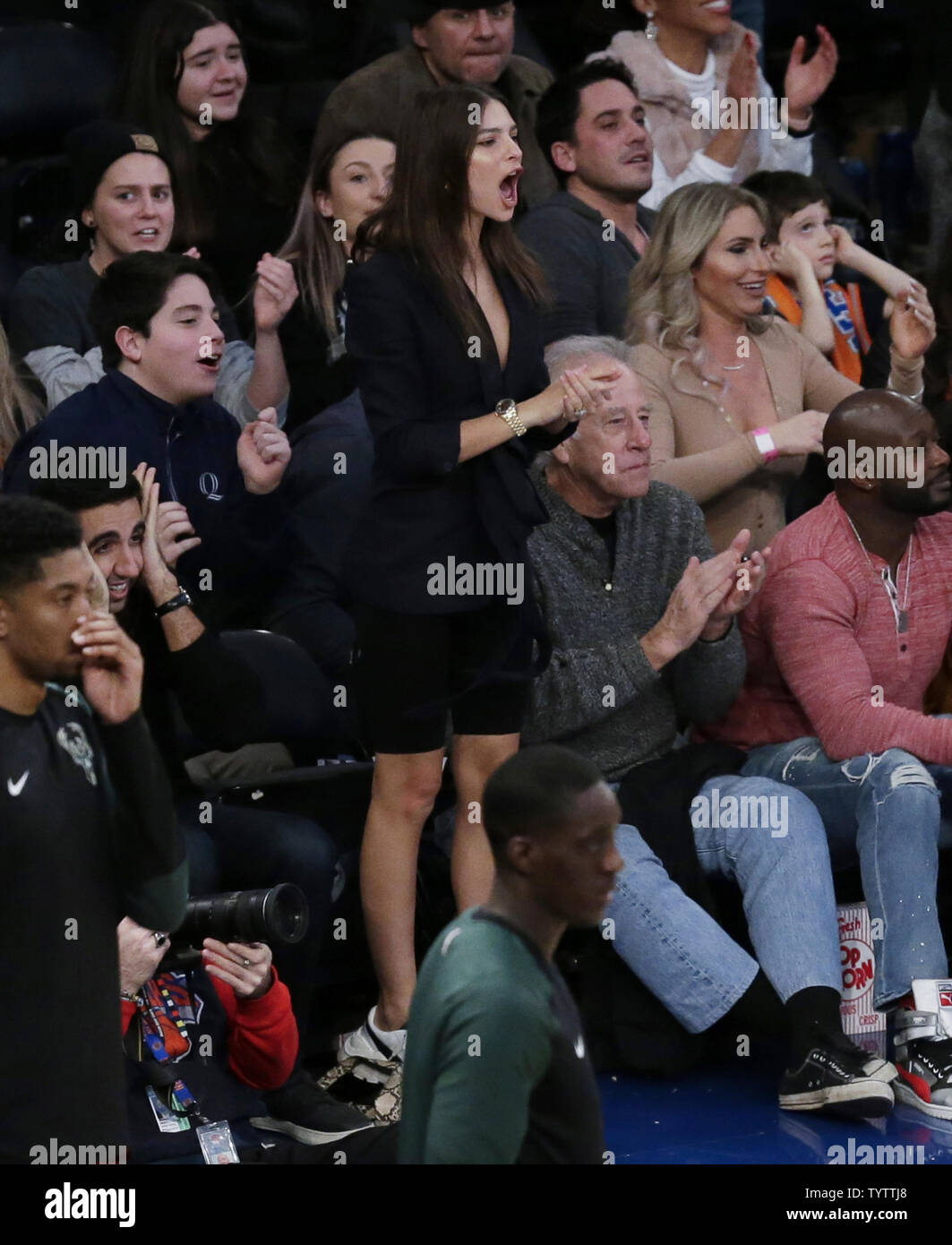 Emily Ratajkowski watches the Milwaukee Bucks play the New York Knicks ...