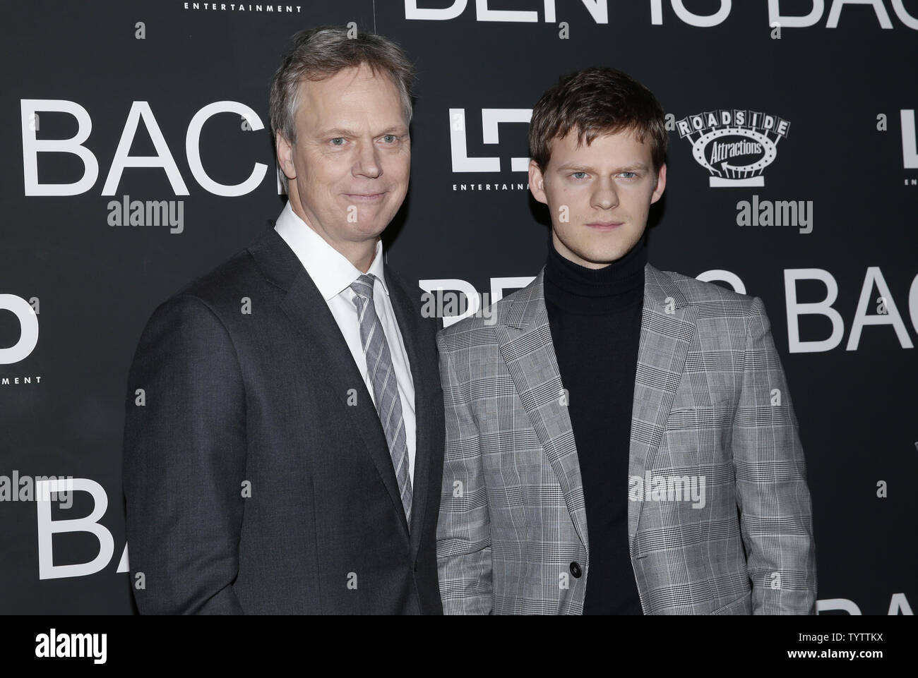 Lucas Hedges and Peter Hedges arrive on the red carpet at the 'Ben is Back' New York premiere at ...