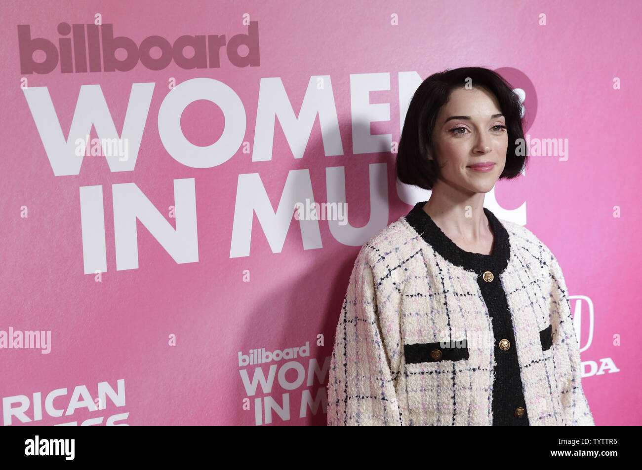 St. Vincent arrives on the red carpet at the Billboard Women In Music ...