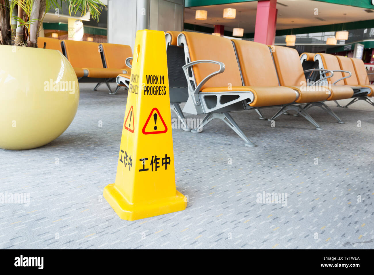 Yellow cone,work in progress signs Stock Photo - Alamy