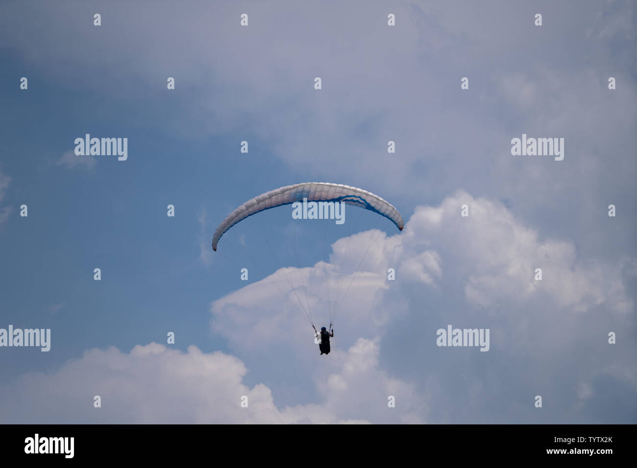 Tourism parachutes action with daylight blue sky high in summer hi-res ...